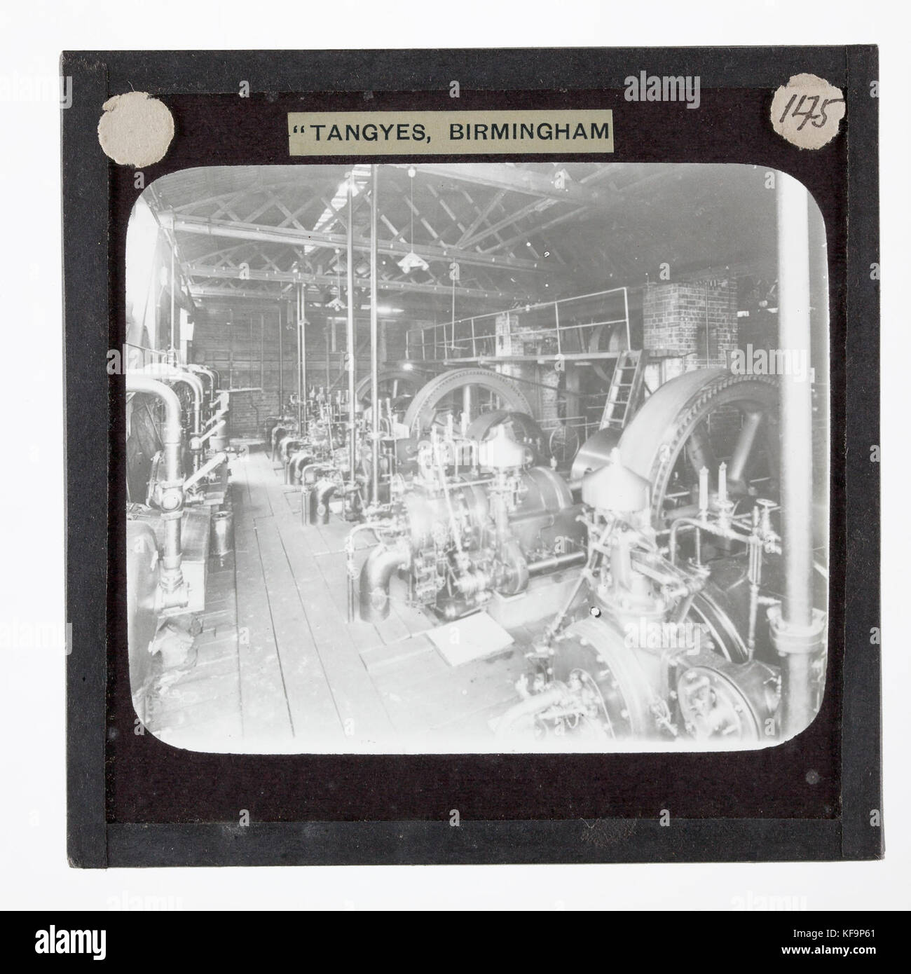 This lantern slide from Tangyes Ltd showcases an industrial gas engine ...