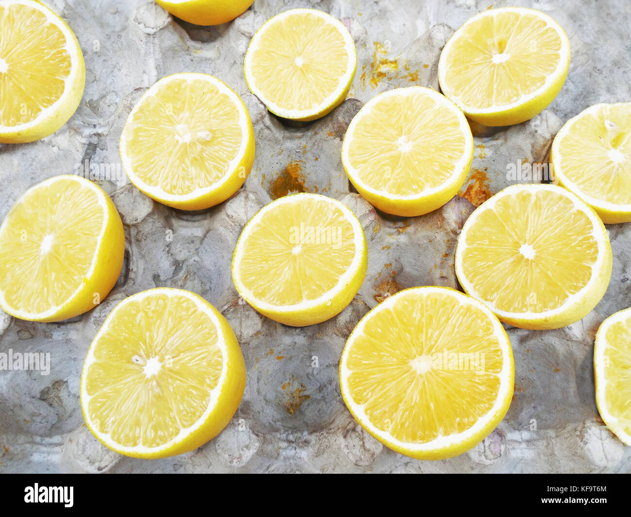 fresh yellow lemons cut in the middle Stock Photo - Alamy