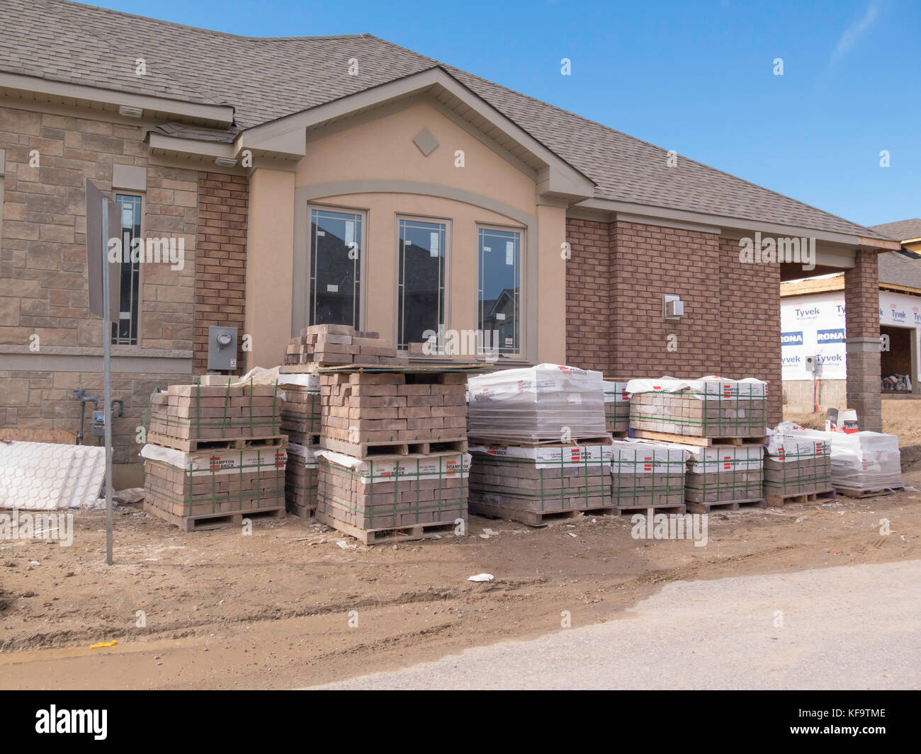 New homes in subdivision being build with 2 story as well as semis ...