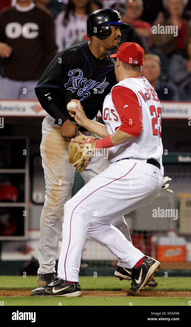 Los Angels Angels third baseman Dallas McPherson, right, tags out Kanas ...