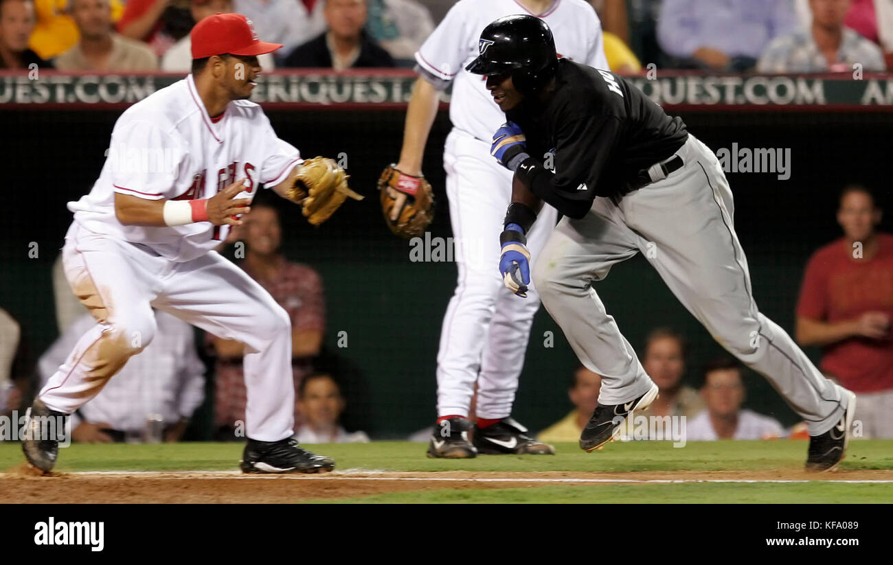 Los Angeles Angels shortstop Orlando Cabrera, left, tags out Toronto ...