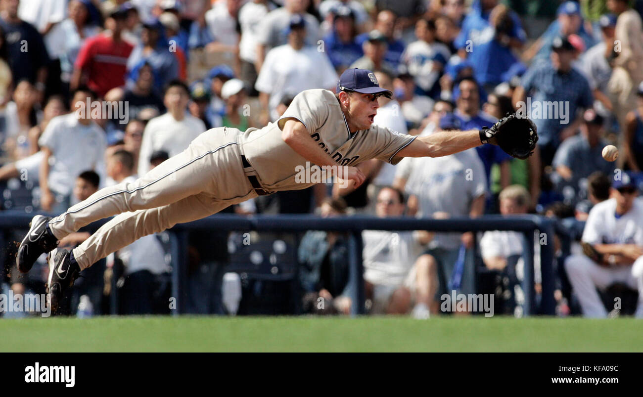 San Diego Padres' third baseman Joe Randa dives for a ball hit by Los ...
