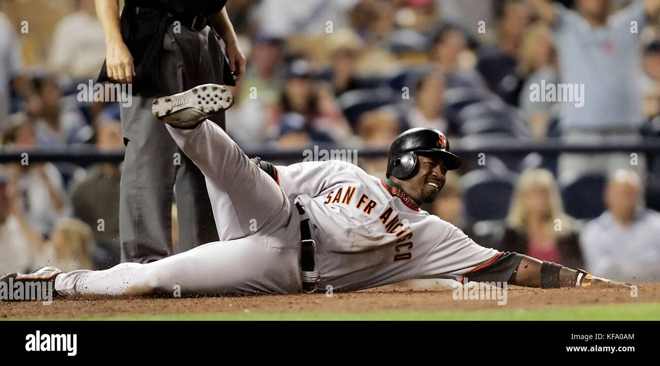 San Francisco Giants' baserunner Ray Durham slides into homeplate ...
