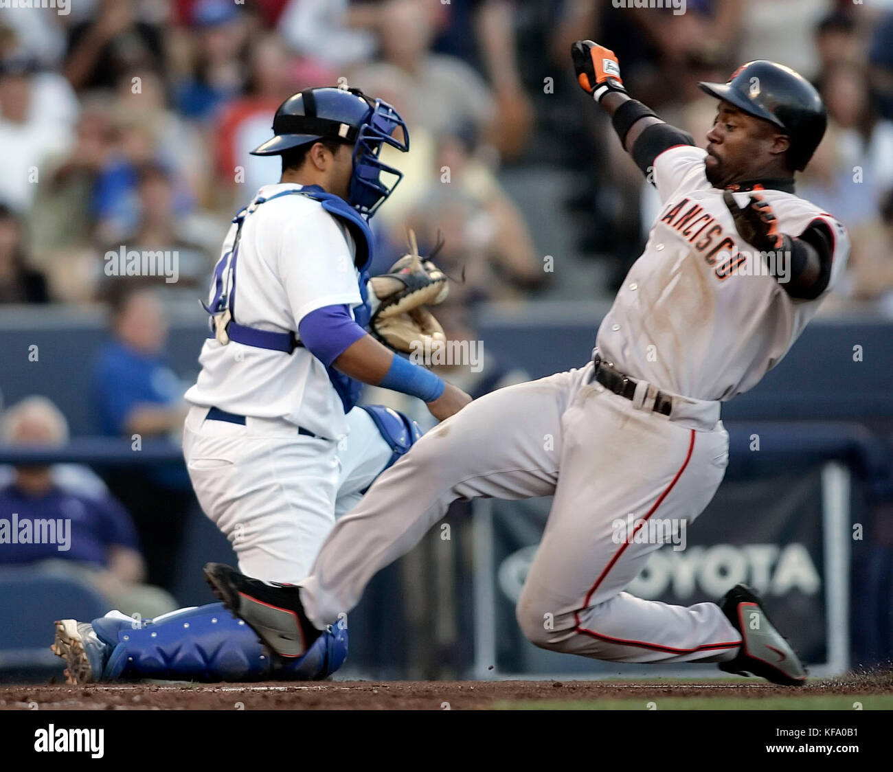 San Francisco Giants' Ray Durham, right, slides into home plate scoring ...