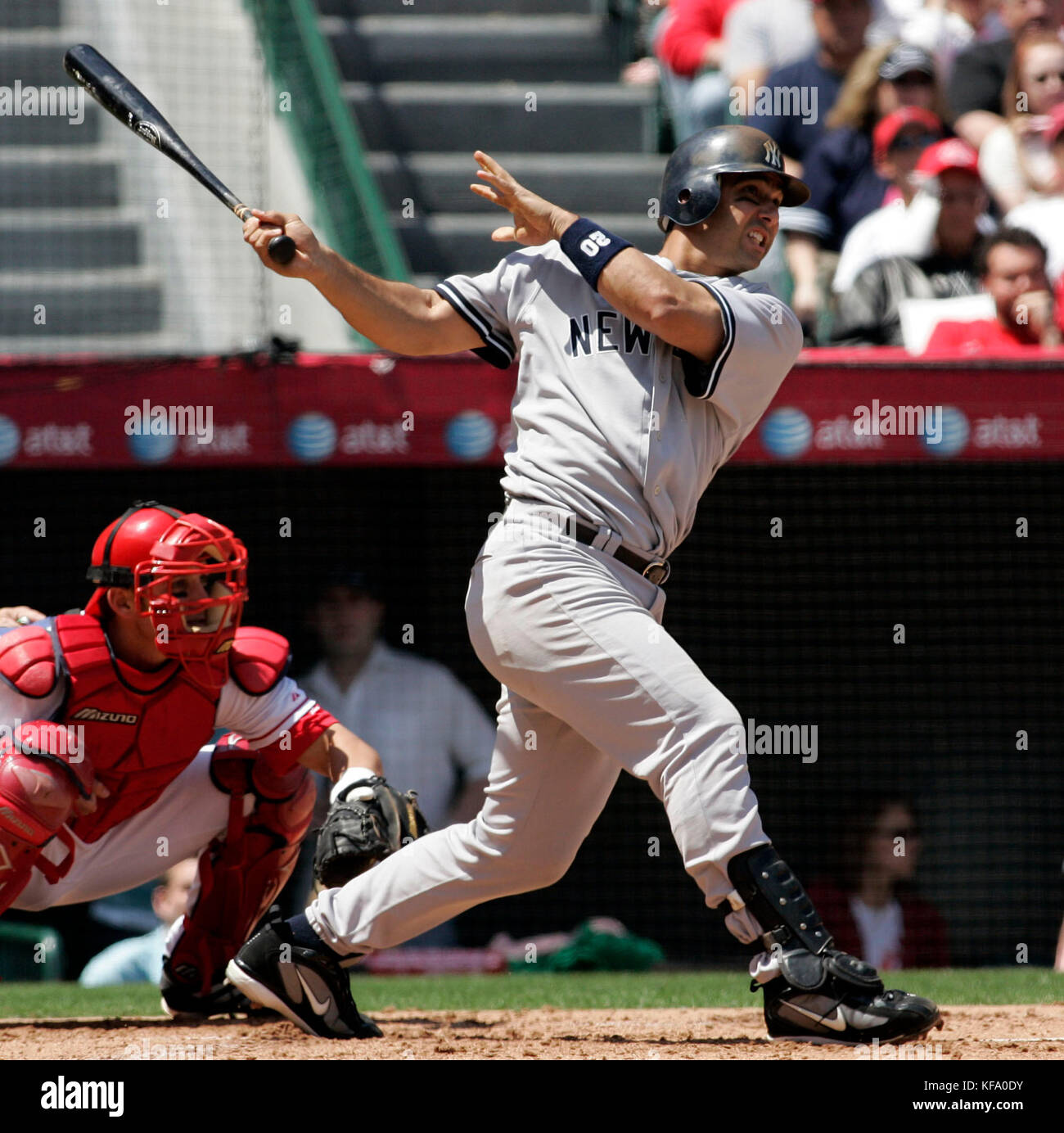 New York Yankees' Jorge Posada, right, watches his three-run homer off ...