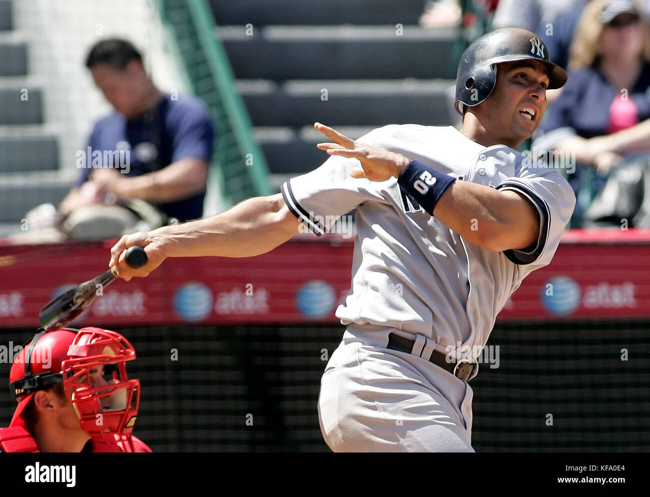 New York Yankees' Jorge Posada, right, watches his home run off Los ...