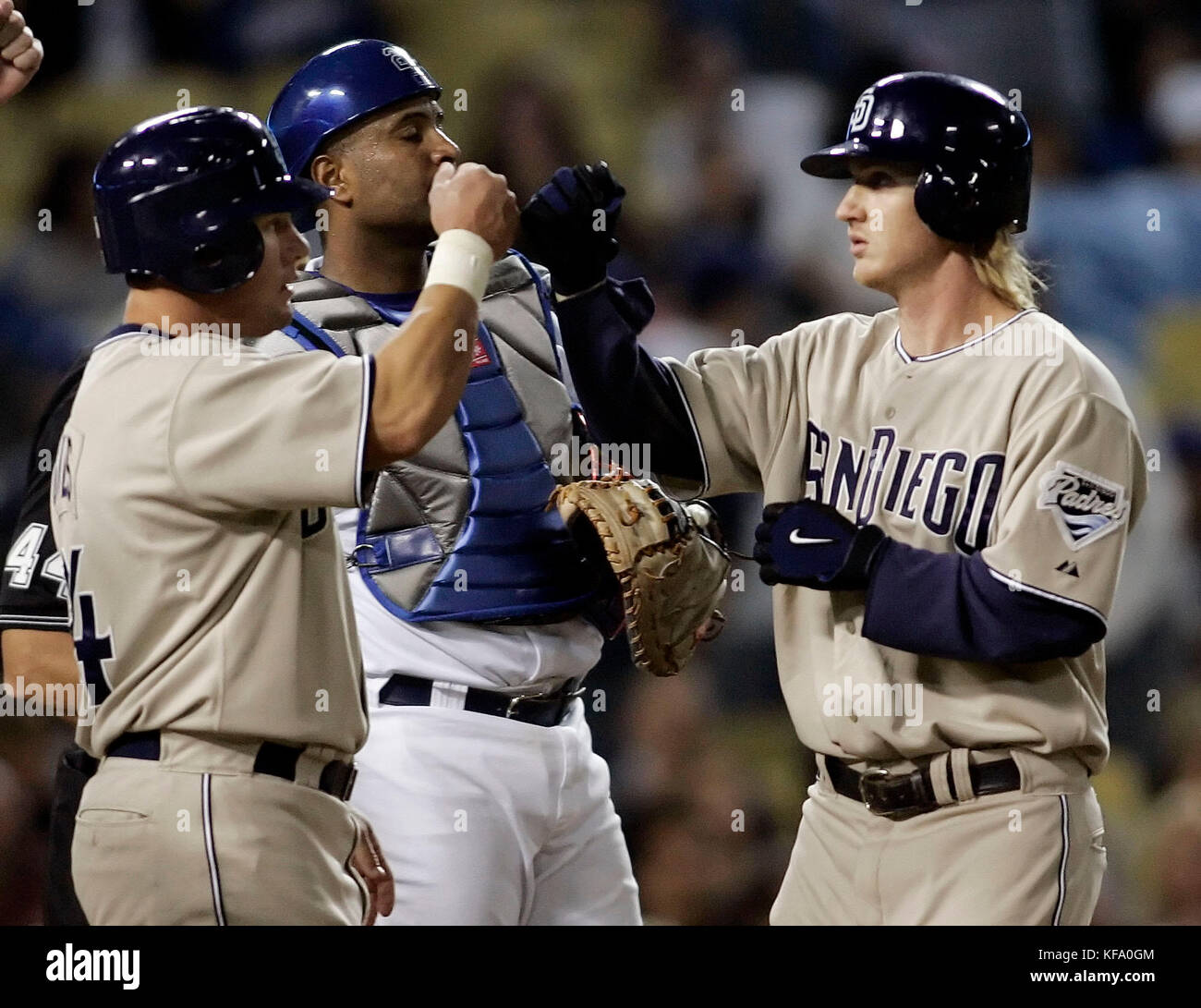 San Diego Padres' Khalil Greene, right, is greeted at homeplate by ...