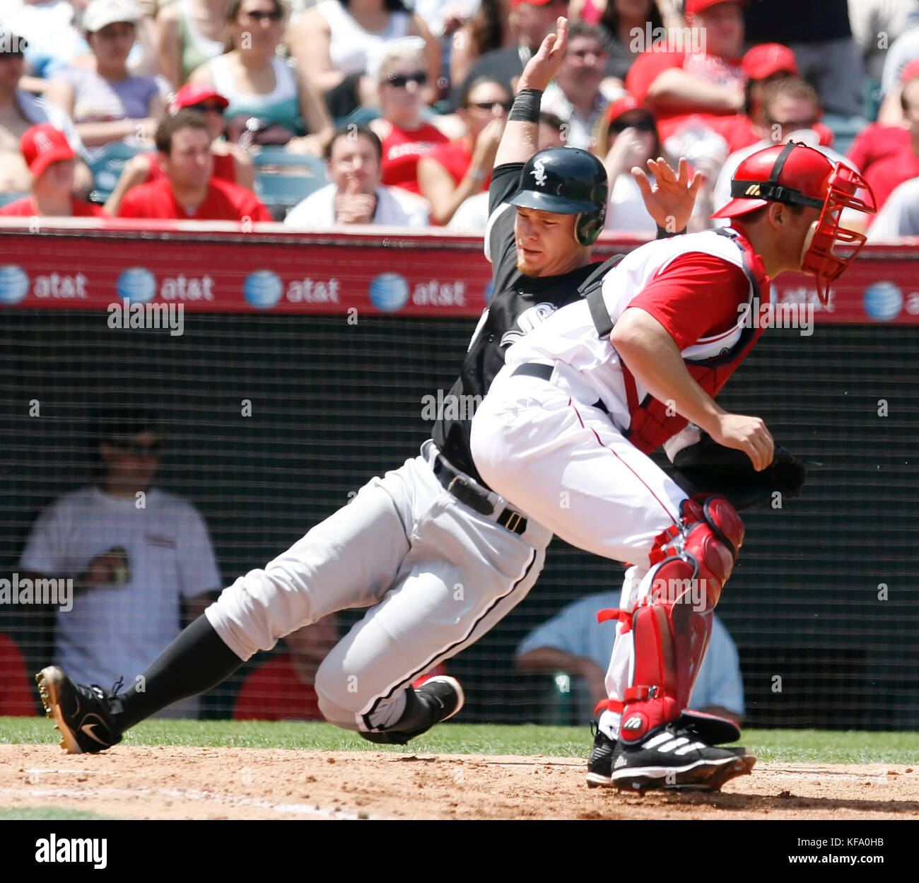 Chicago White Sox's Joe Crede, left, slides into home past Los Angeles ...