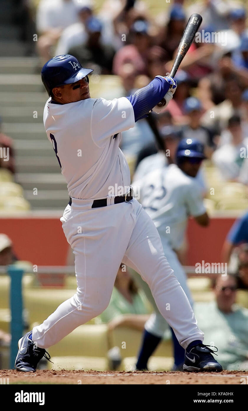 Los Angeles Dodgers' Olmedo Saenz follows through on a two-run homer ...