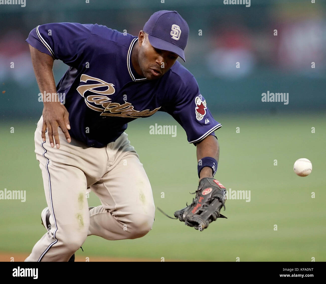 San Diego Padres second baseman Josh Barfield tries to field a ball hit ...