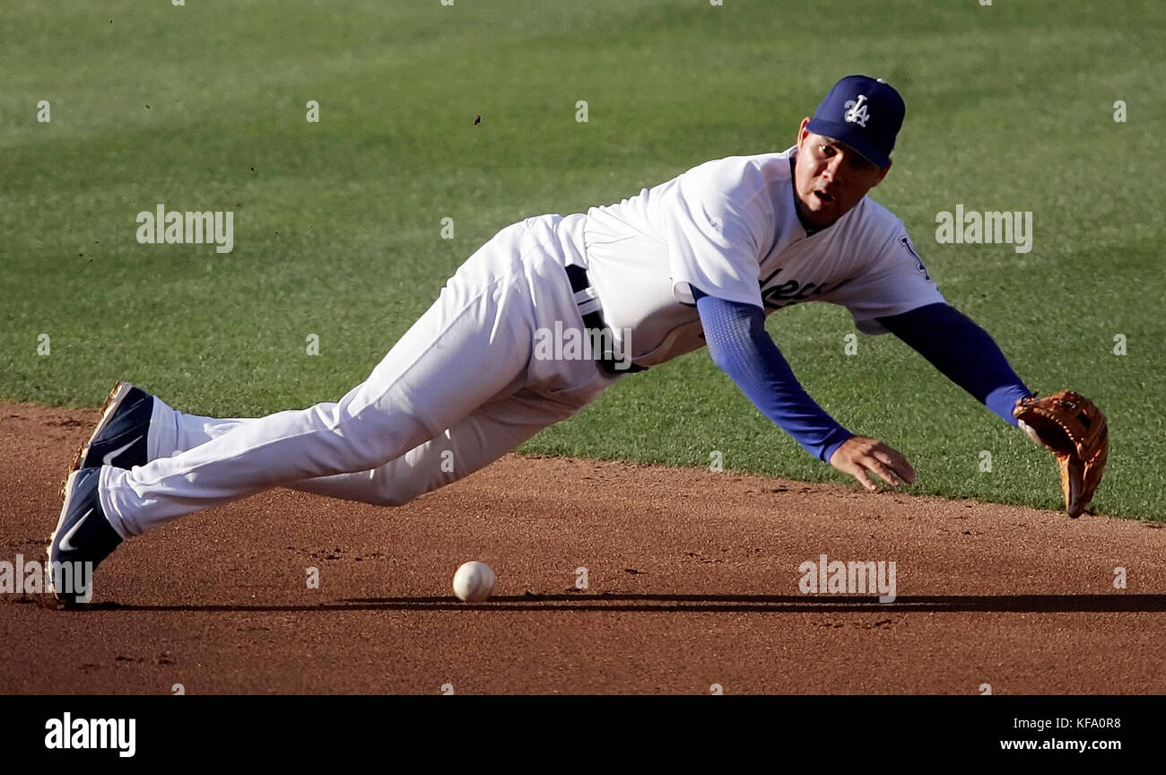 Los Angeles Dodgers second baseman Ramon Martinez makes a diving catch ...
