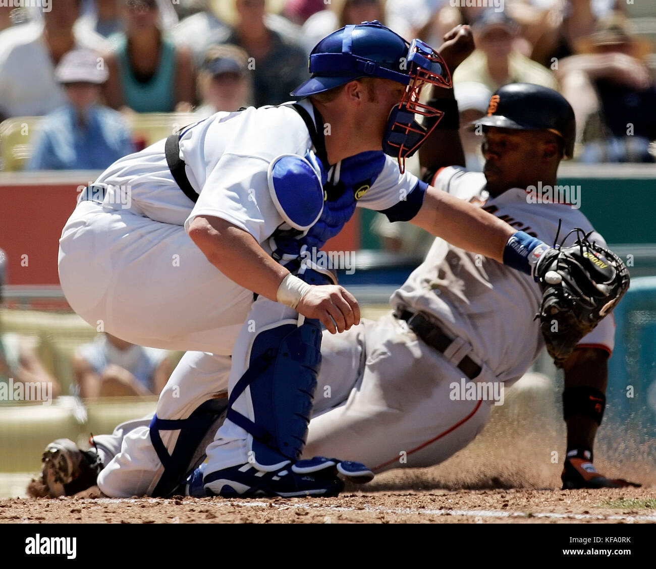 San Francisco Giants' Ray Durham, right, slides safely into home as Los ...