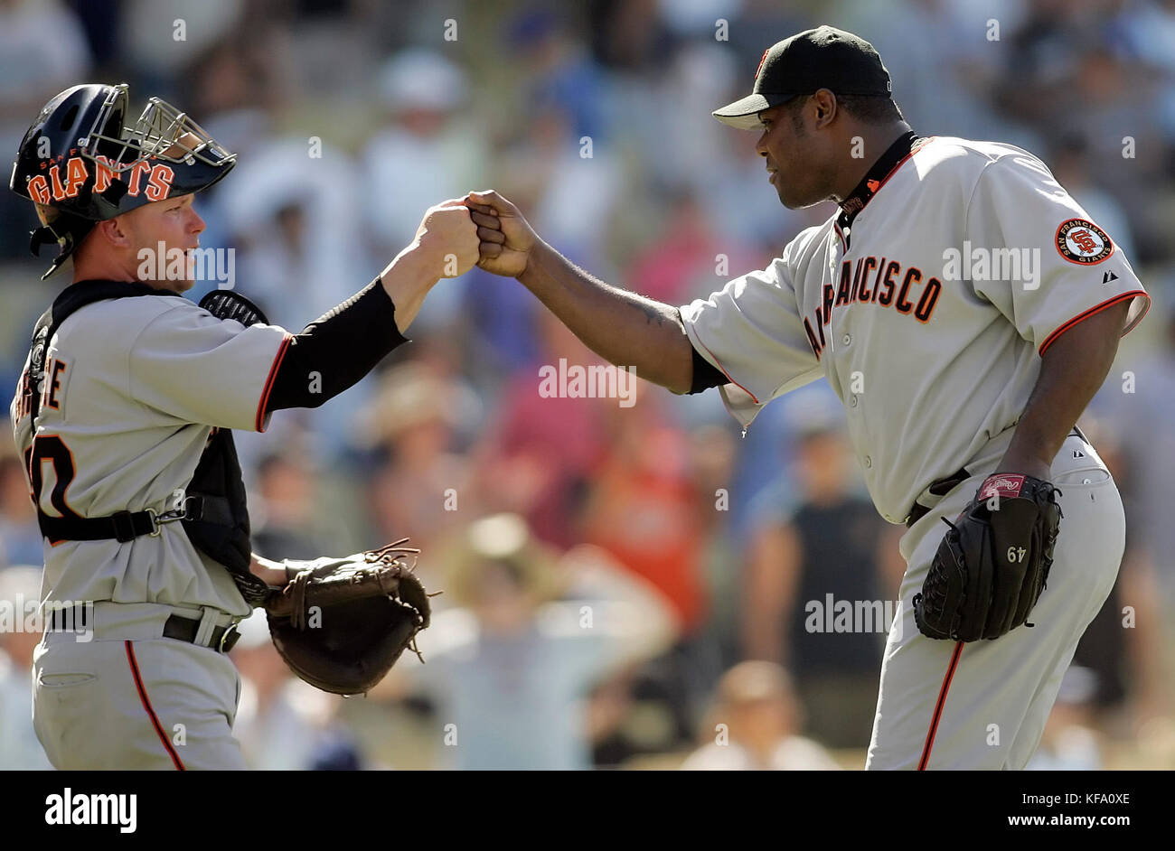 San Francisco Giants relief pitcher Armando Benitez, right, celebrates ...