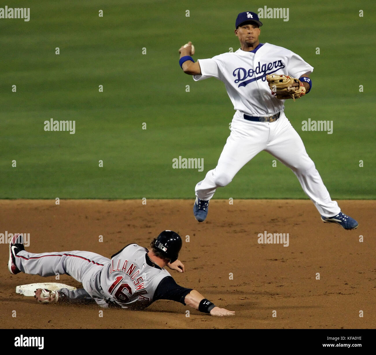 Los Angeles Dodgers shortstop Rafael Furcal, right, makes a leaping ...