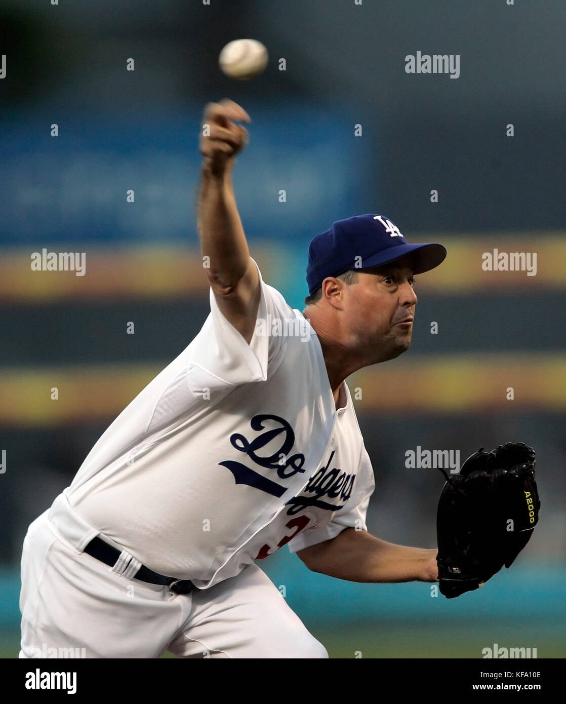 Los Angeles Dodgers' Greg Maddux pitches against the Colorado Rockies ...
