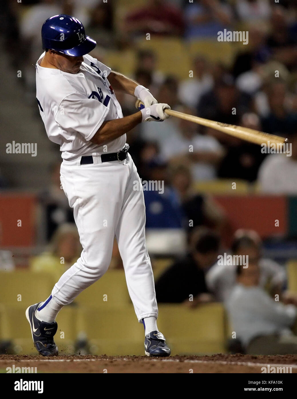 Los Angeles Dodgers' Greg Maddux hits an RBI single off Cincinnati Reds ...