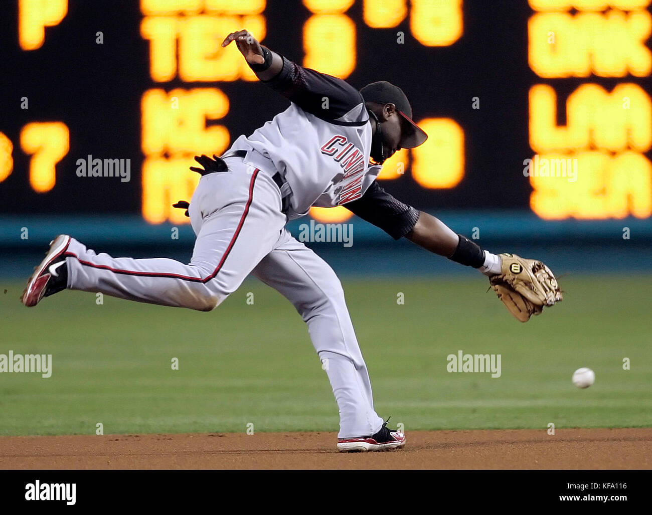 Cincinnati Reds second baseman Brandon Phillips lunges for a ball hit ... Cincinnati Reds second baseman Brandon Phillips lunges for a ball hit ...