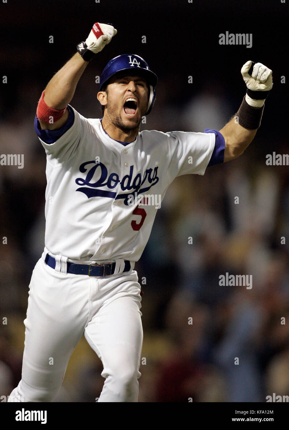Los Angeles Dodgers' Nomar Garciaparra celebrates his walk-off two-run ...