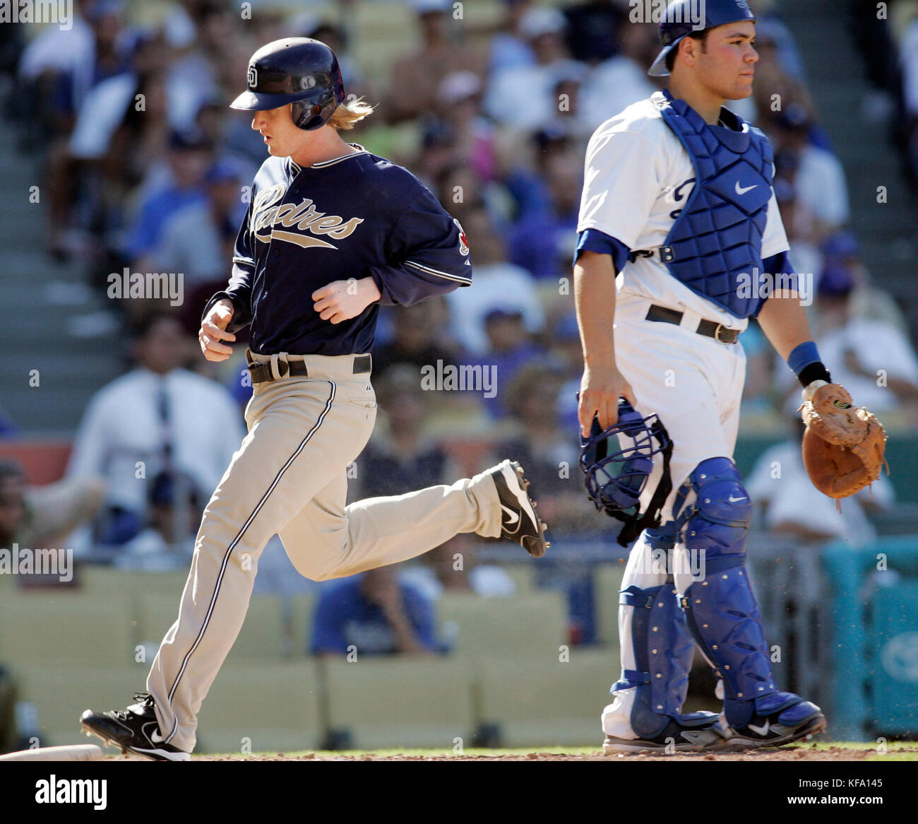 San Diego Padres Khalil Greene, left, scores the go-ahead run as Los ...