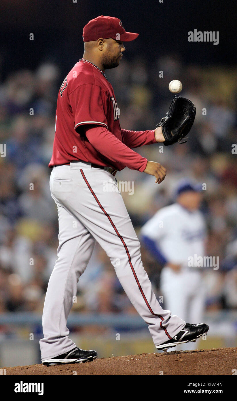 Arizona Diamondbacks pitcher Livan Hernandez flips the ball up in the ...
