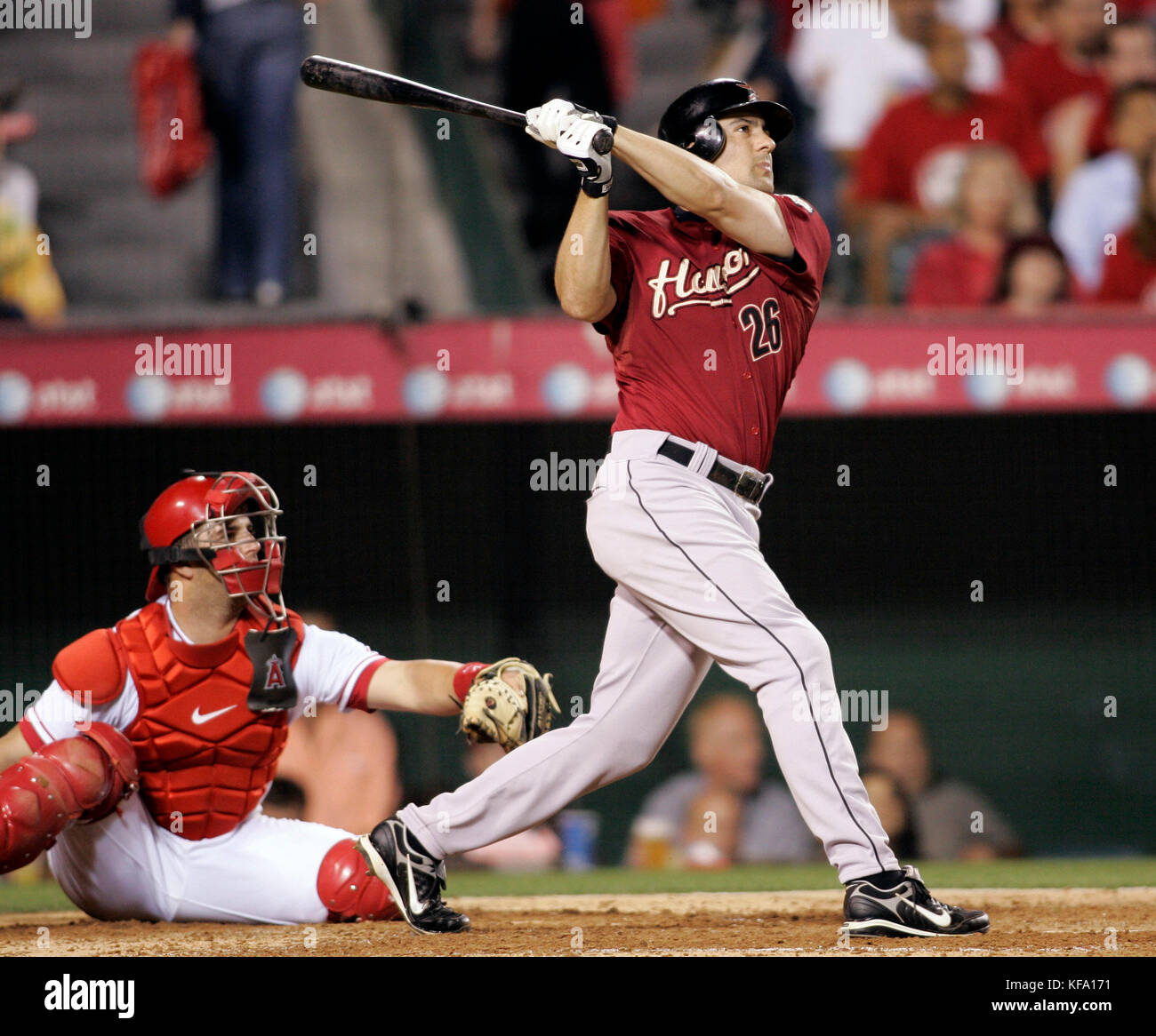 Houston Astros' Mike Lamb, right, follows through on his three-run ...
