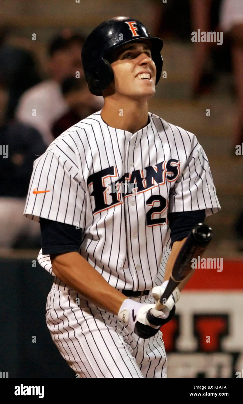 Fullerton's Danny Dorn watches his grand slam home run hit off Harvard ...