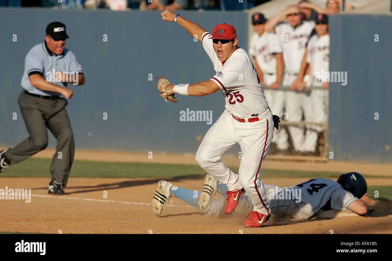 Fresno State first baseman Kent Sakamoto (25) celebrates after tagging ...