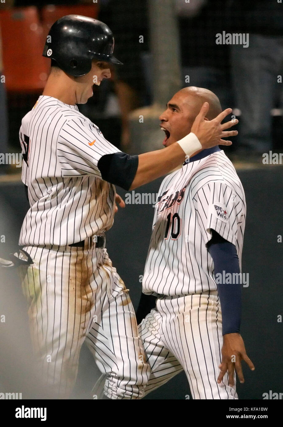 Cal State Fullerton's Danny Dorn, left, celebrates with teammate Ricky ...