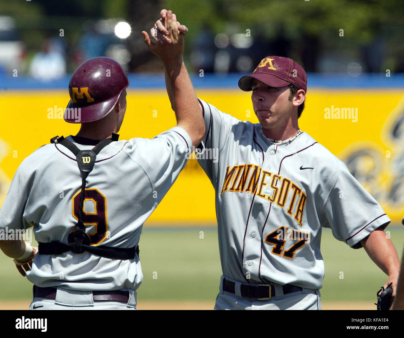 Minnesota pitcher Brian Bull, right, celebrates his team's 7-5 win ...