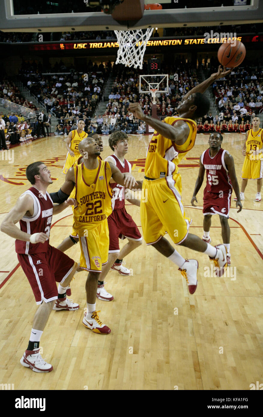 Southern California's O.J. Mayo goes up to the basket with the ball ...