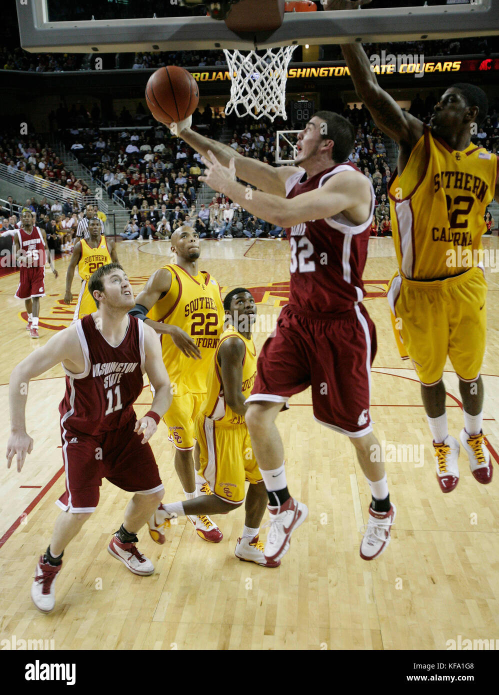 Washington State's Daven Harmeling lays the ball up past Southern ...