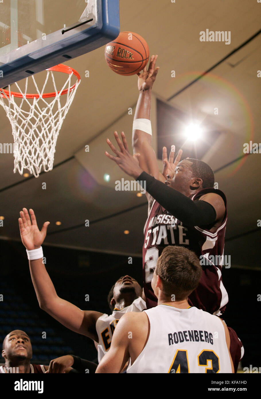 Mississippi State's Charles Rhodes, right, lays the ball in over UC ...