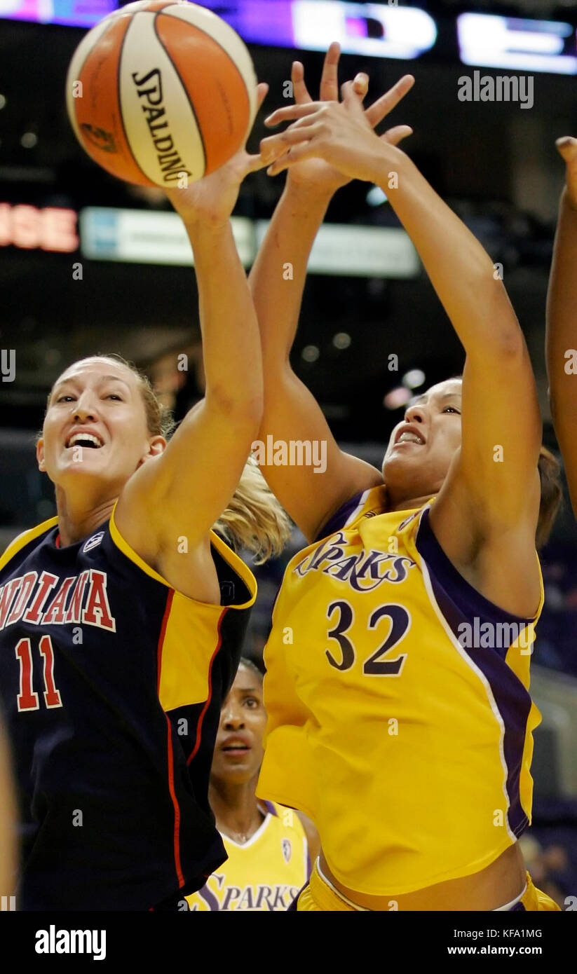 Los Angeles Sparks' Christi Thomas, right, and Indiana Fever's Kelly ...