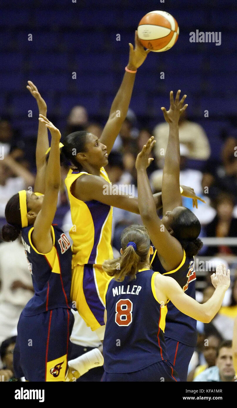 Los Angeles Sparks' Lisa Leslie, center, shoots over Indiana Fever's ...