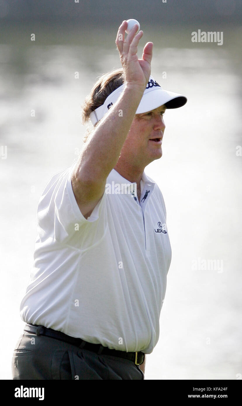 Peter Jacobsen holds the ball to the gallery after saving par on the ...
