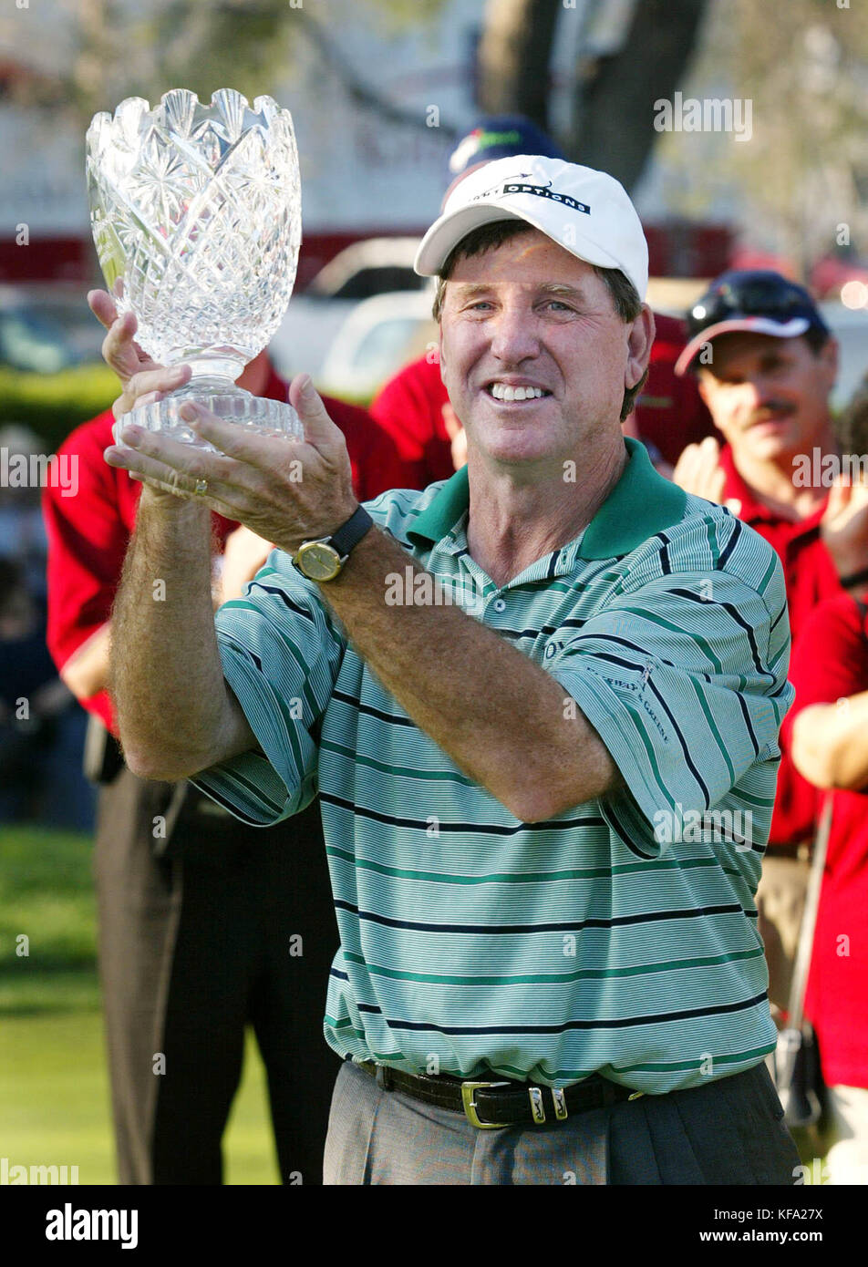 Gil Morgan holds the trophy for winning the SBC Classic Champions Tour ...