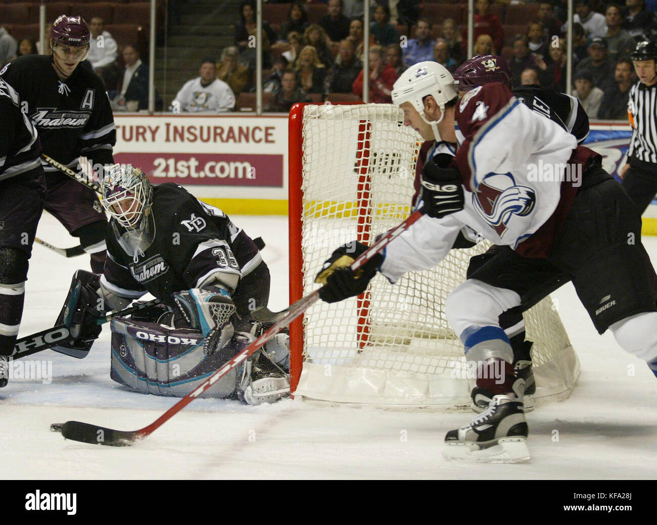 Anaheim Mighty Ducks goalie Jean-Sebastien Giguere stops the shot by ...