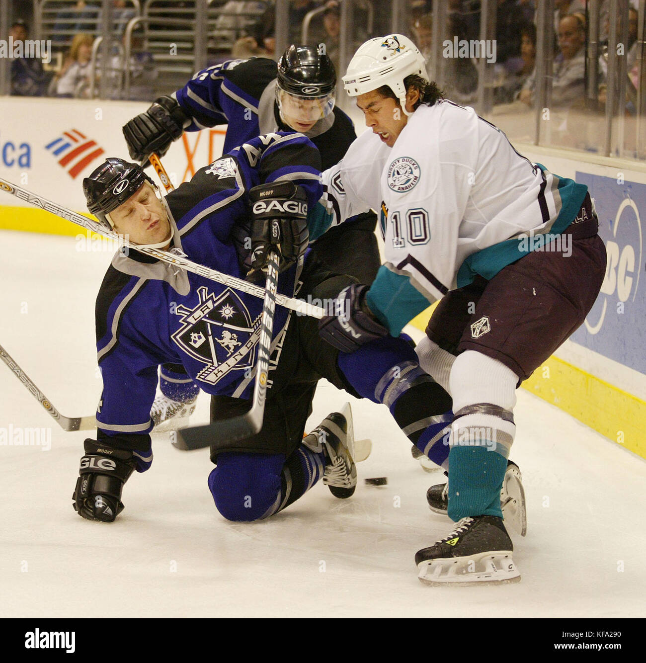 Anaheim Mighty Ducks Jason Krog, (R), pushes down Los Angeles Kings ...