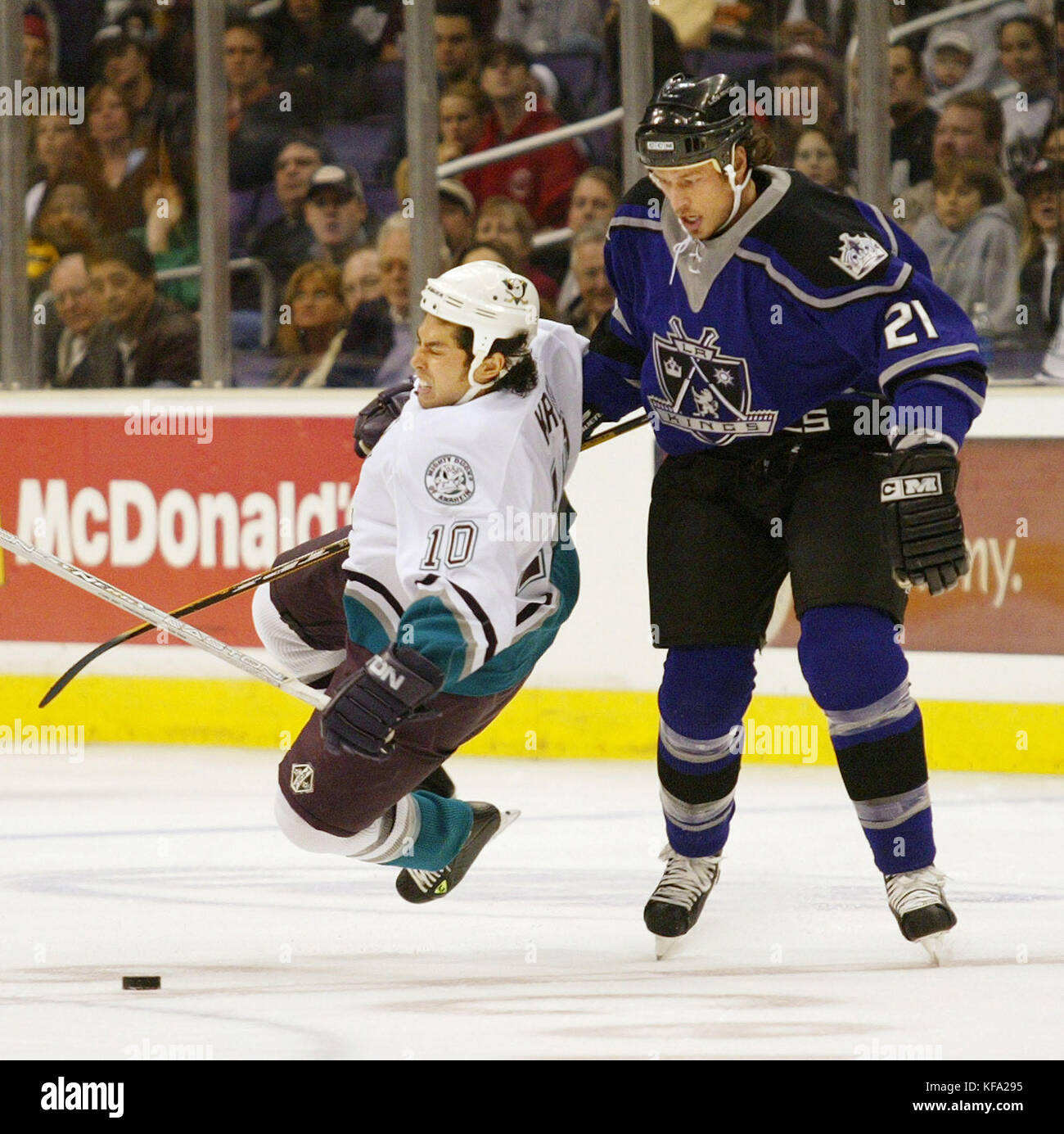 Los Angeles Kings John Tripp, (R) throws Anaheim Mighty Ducks Jason ...