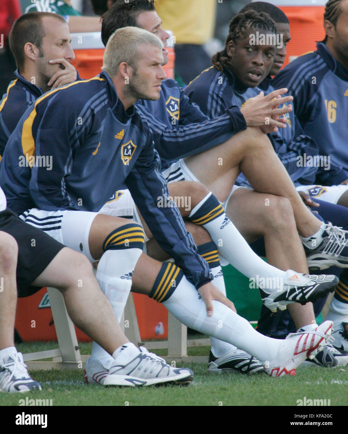 Los Angeles Galaxy's David Beckham holds his leg while siting on the ...