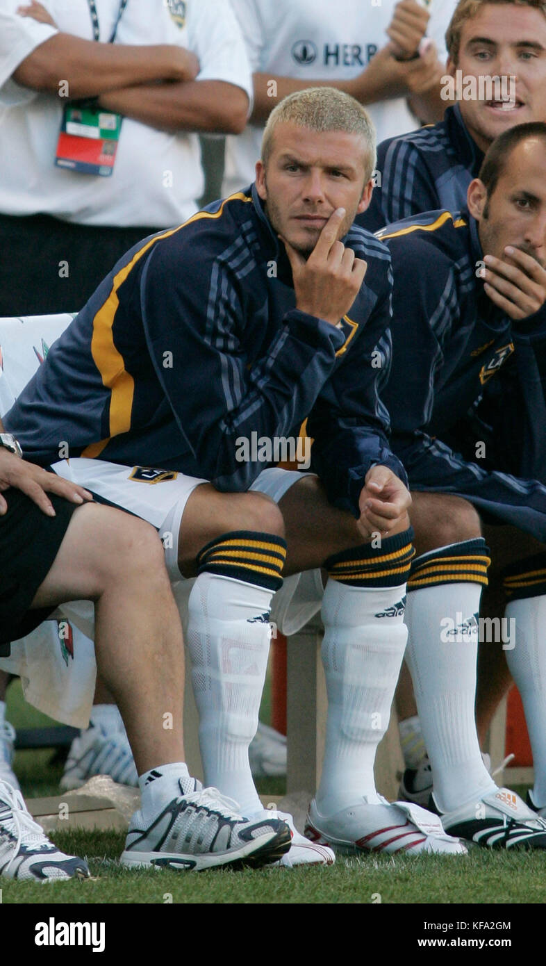 Los Angeles Galaxy's David Beckham sits on the bench during a game ...