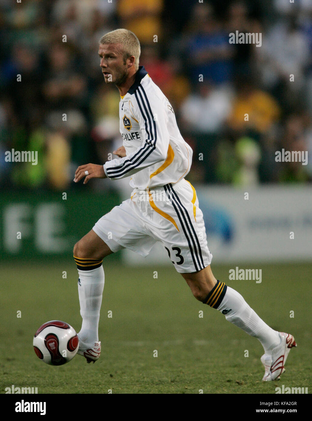 Los Angeles Galaxy's David Beckham brings the ball up against Chelsea ...