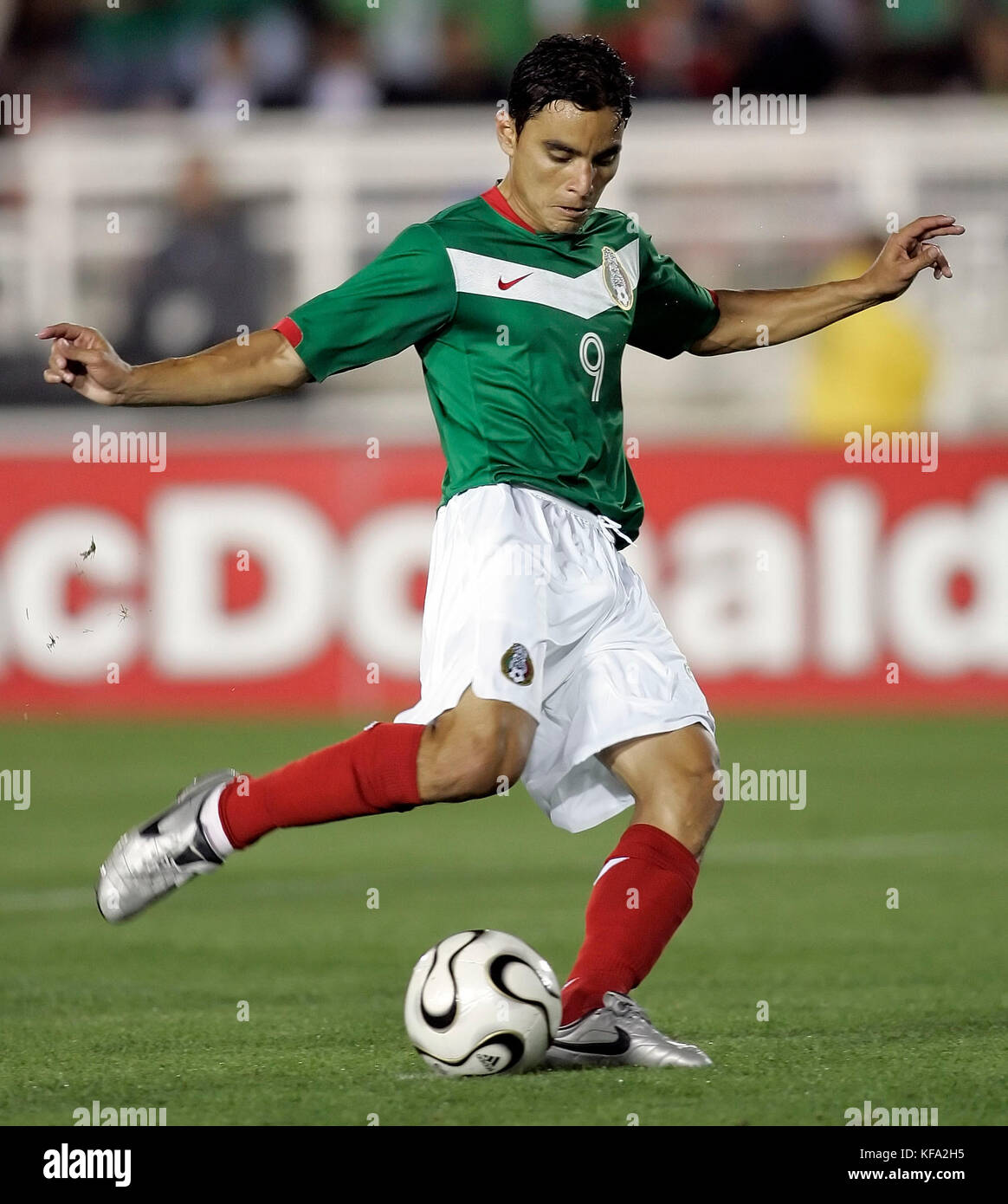 Mexico's Omar Bravo scores on a penalty kick against Venezuela in the ...