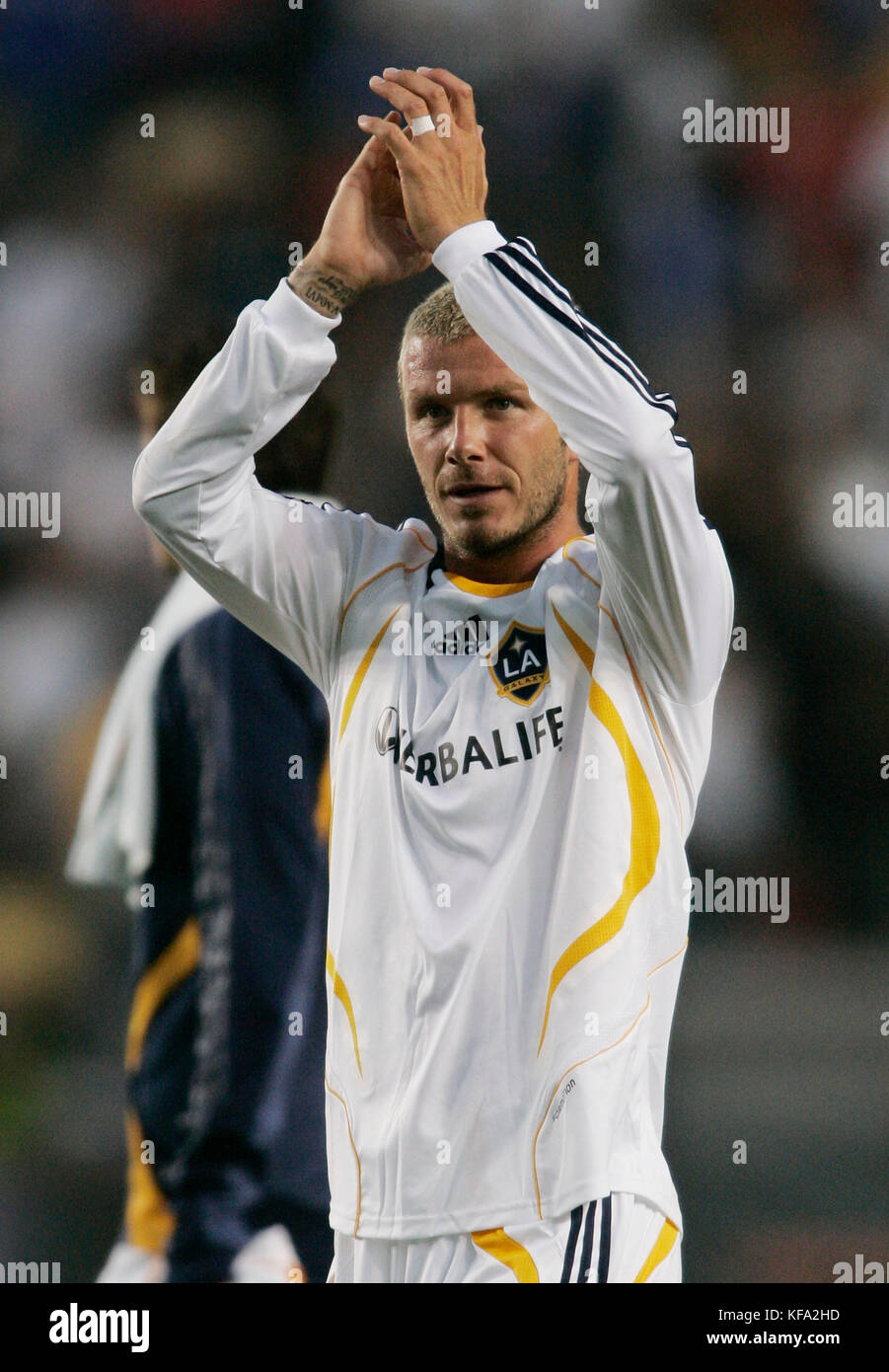 Los Angeles Galaxy's David Beckham claps his hands to fans after his ...