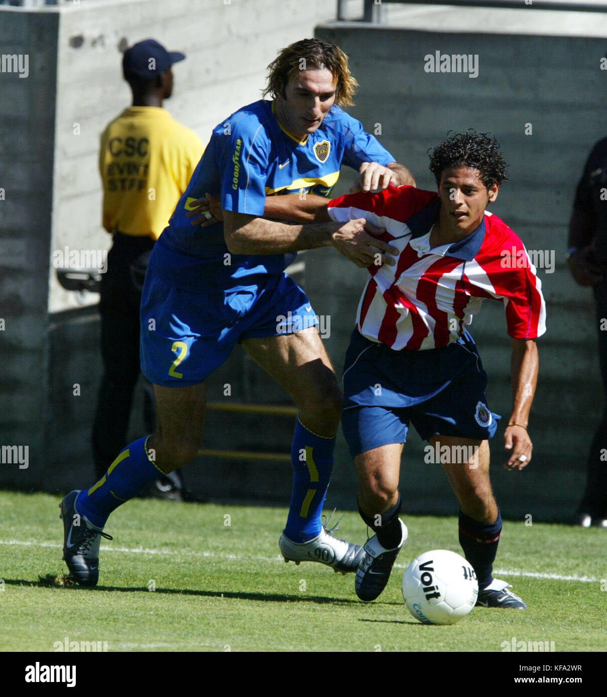 Chivas' Alejandro Vela of Mexico, right, tries to get away from Boca ...