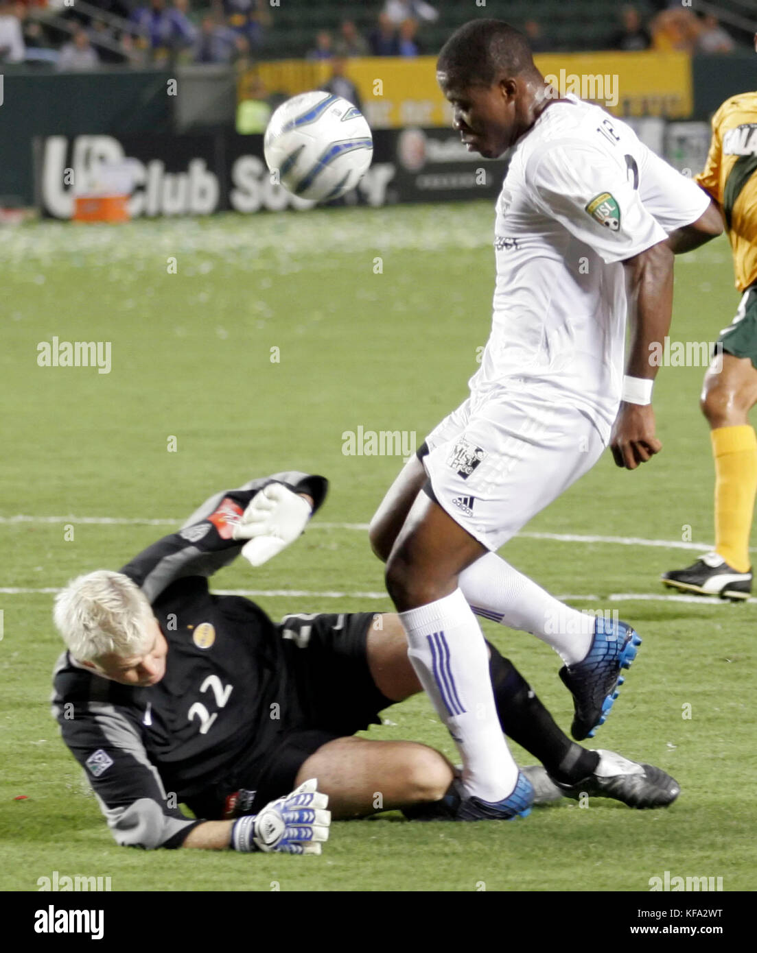 Los Angeles Galaxy goalkeeper Kevin Hartman, left, blocks the kick of ...