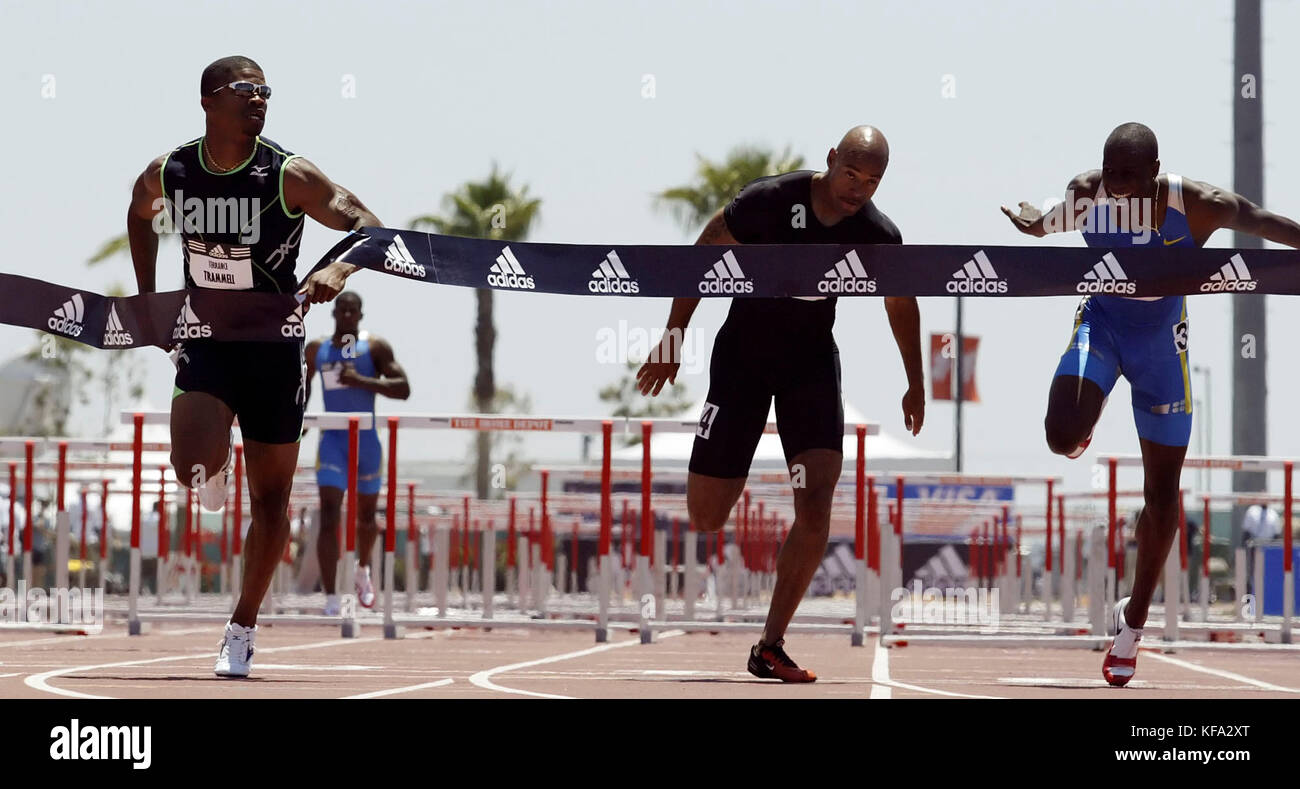 Terrence Trammell, left, breaks the tape first as Dominique Arnold ...