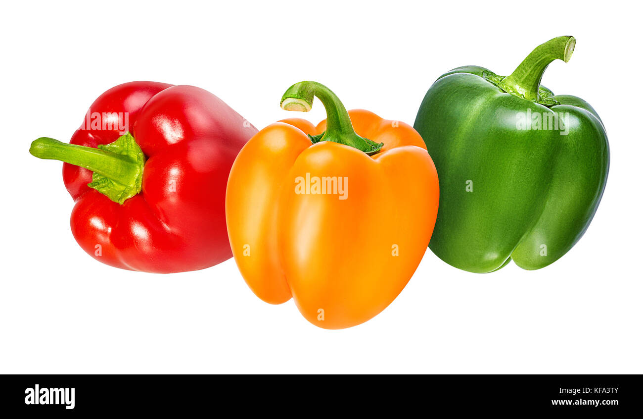 Red, green and yellow peppers isolated. With clipping path Stock Photo ...