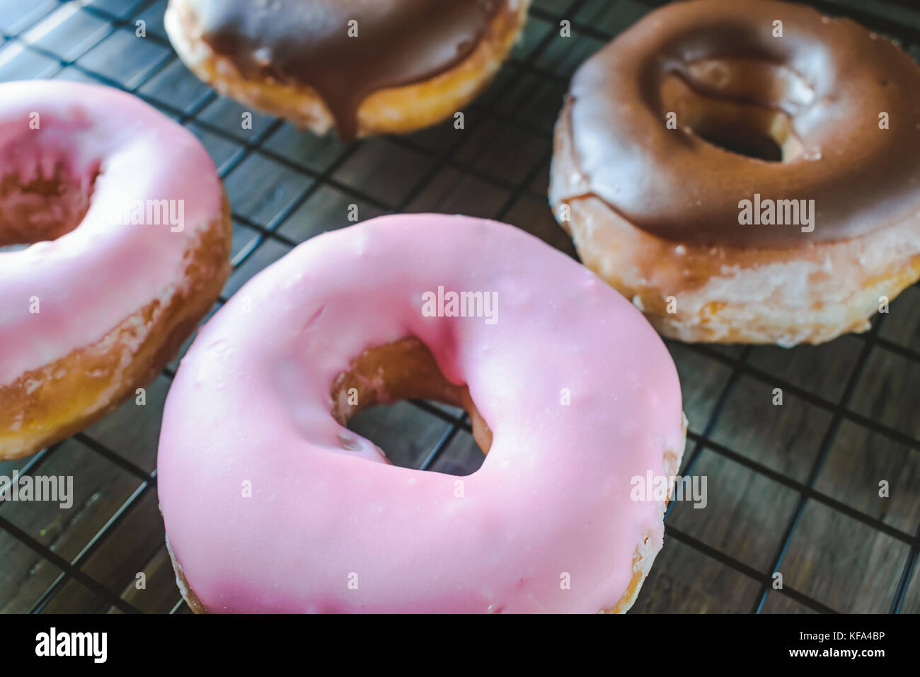 Donuts on Cooling Rack; Doughnut on Wire Rack Stock Photo - Alamy