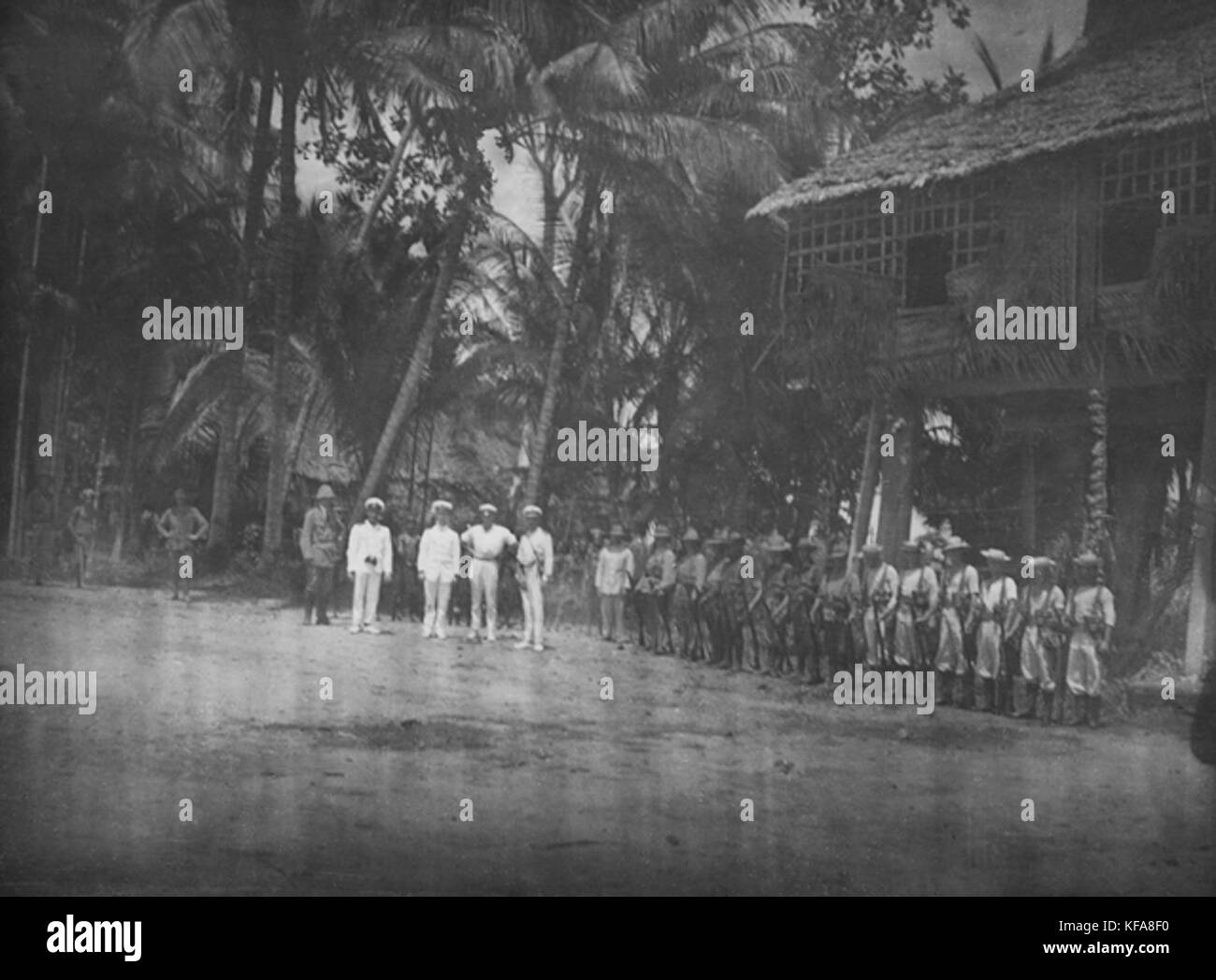 A symbolic or ceremonial flag-raising event by the ANMEF, possibly ...